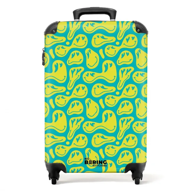Patterns - Pattern of distorted emojis on blue background A Suitcase ...